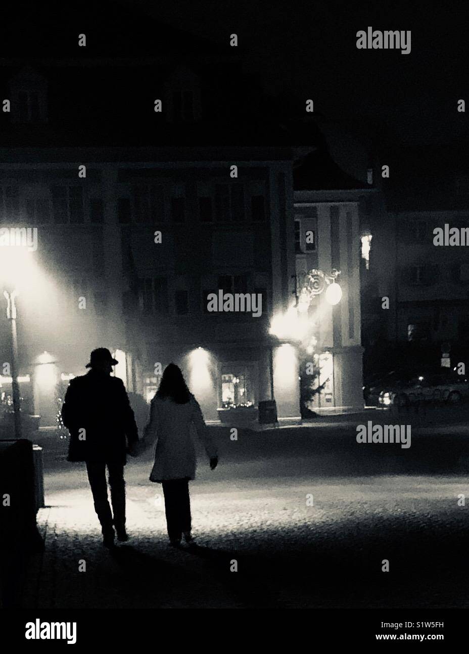 Couple walking night hi-res stock photography and images - Alamy