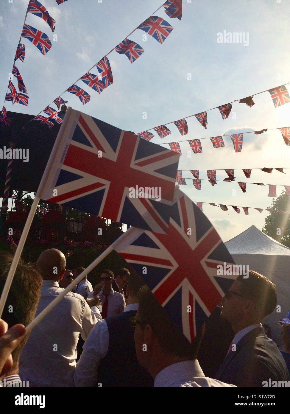 Waving union jack flags hi-res stock photography and images - Alamy