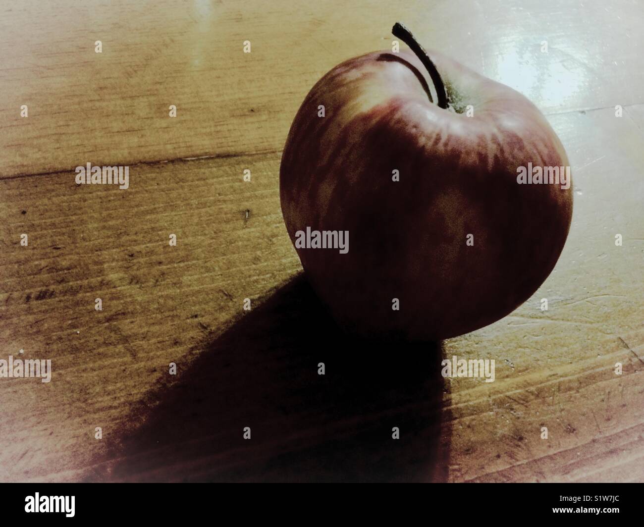 Apple with shadow hi-res stock photography and images - Alamy
