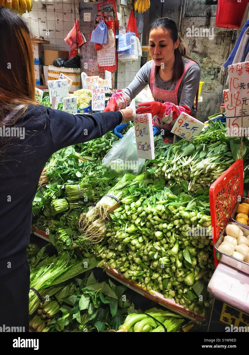 Chinese vegetables for sale in Yuen Long food market (“wet market ...