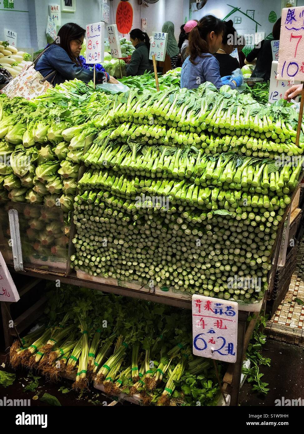 Chinese vegetables for sale in Yuen Long food market (“wet market ...