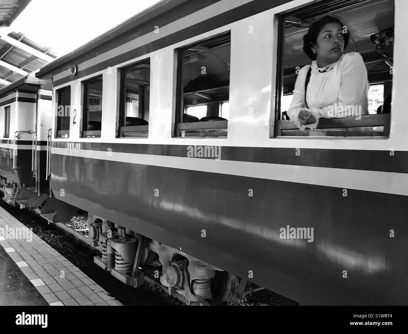 Lady on train Black and White Stock Photos & Images - Alamy
