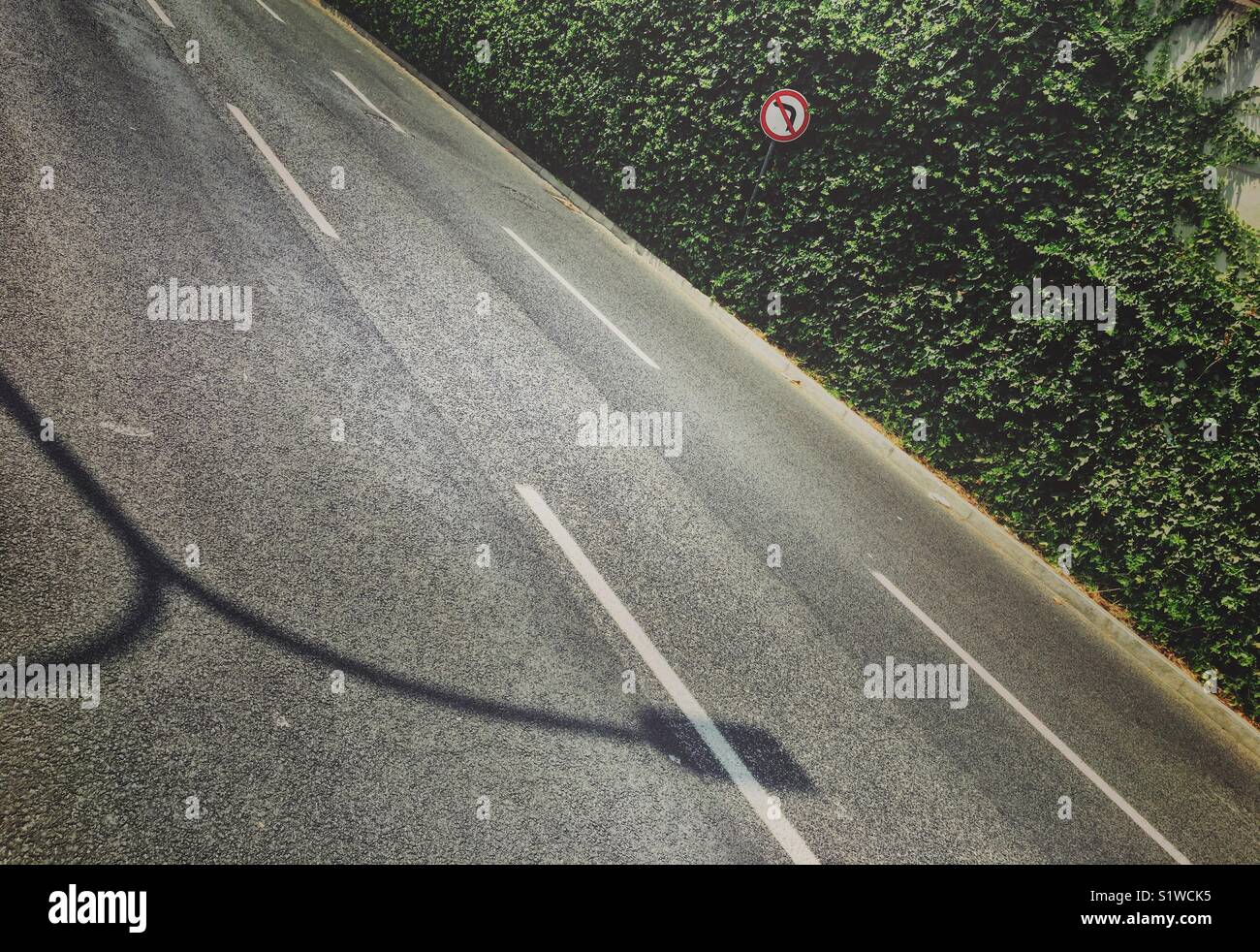 Shadow road sign hi-res stock photography and images - Alamy