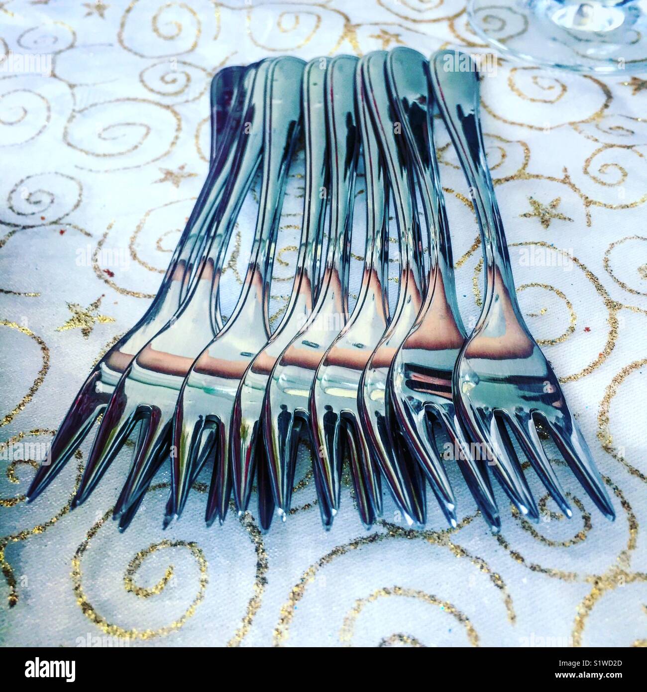 Dessert forks on festive table Stock Photo - Alamy