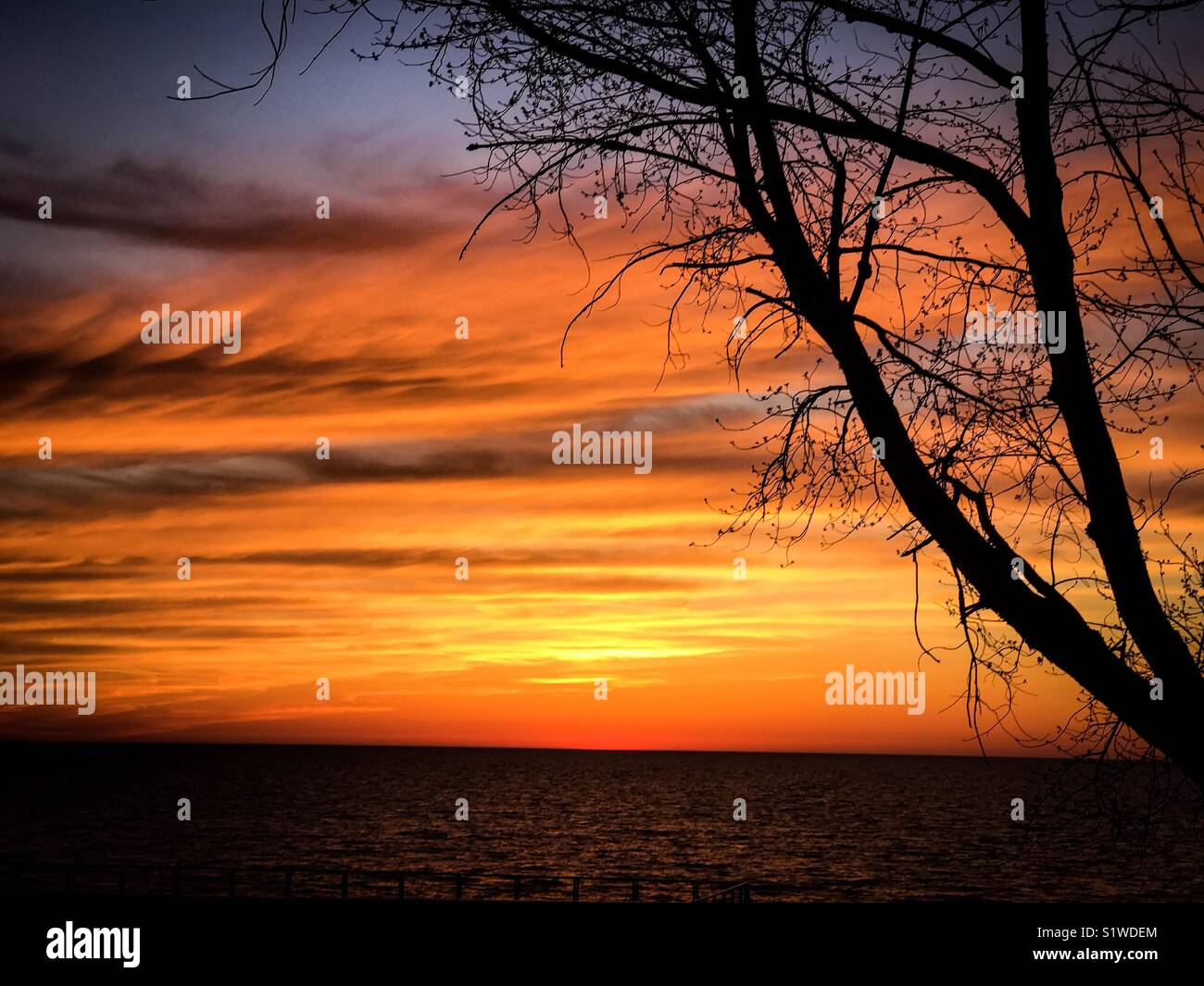 Sunset in Lake Erie Stock Photo - Alamy