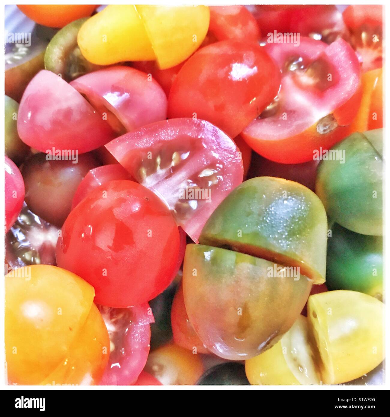 Mixed tomato salad Stock Photo - Alamy