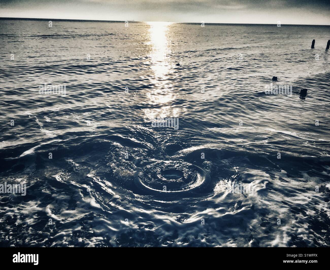 Lorry wheel washed up on a beach hi-res stock photography and images ...