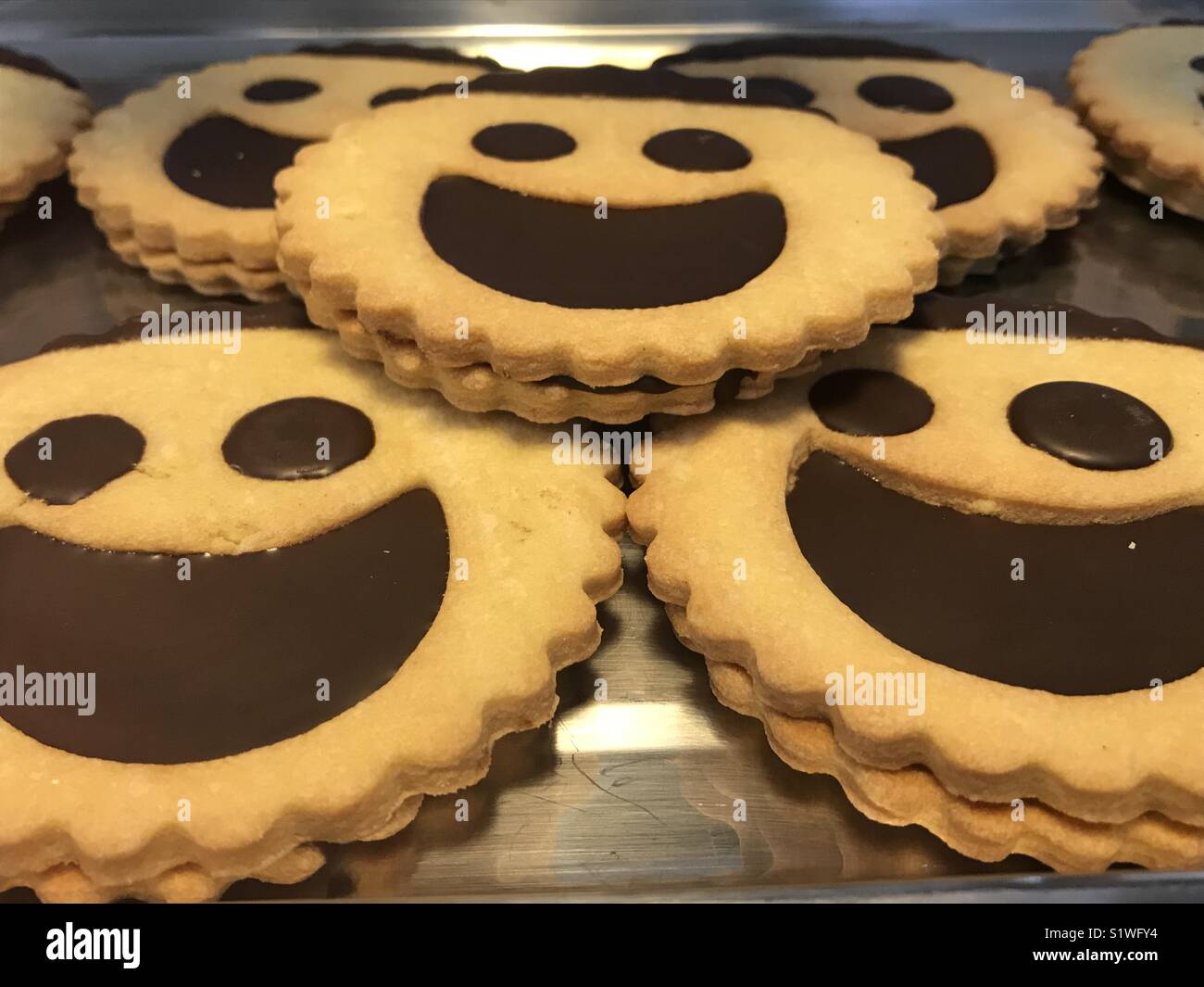 Smiling cookie biscuits Stock Photo - Alamy