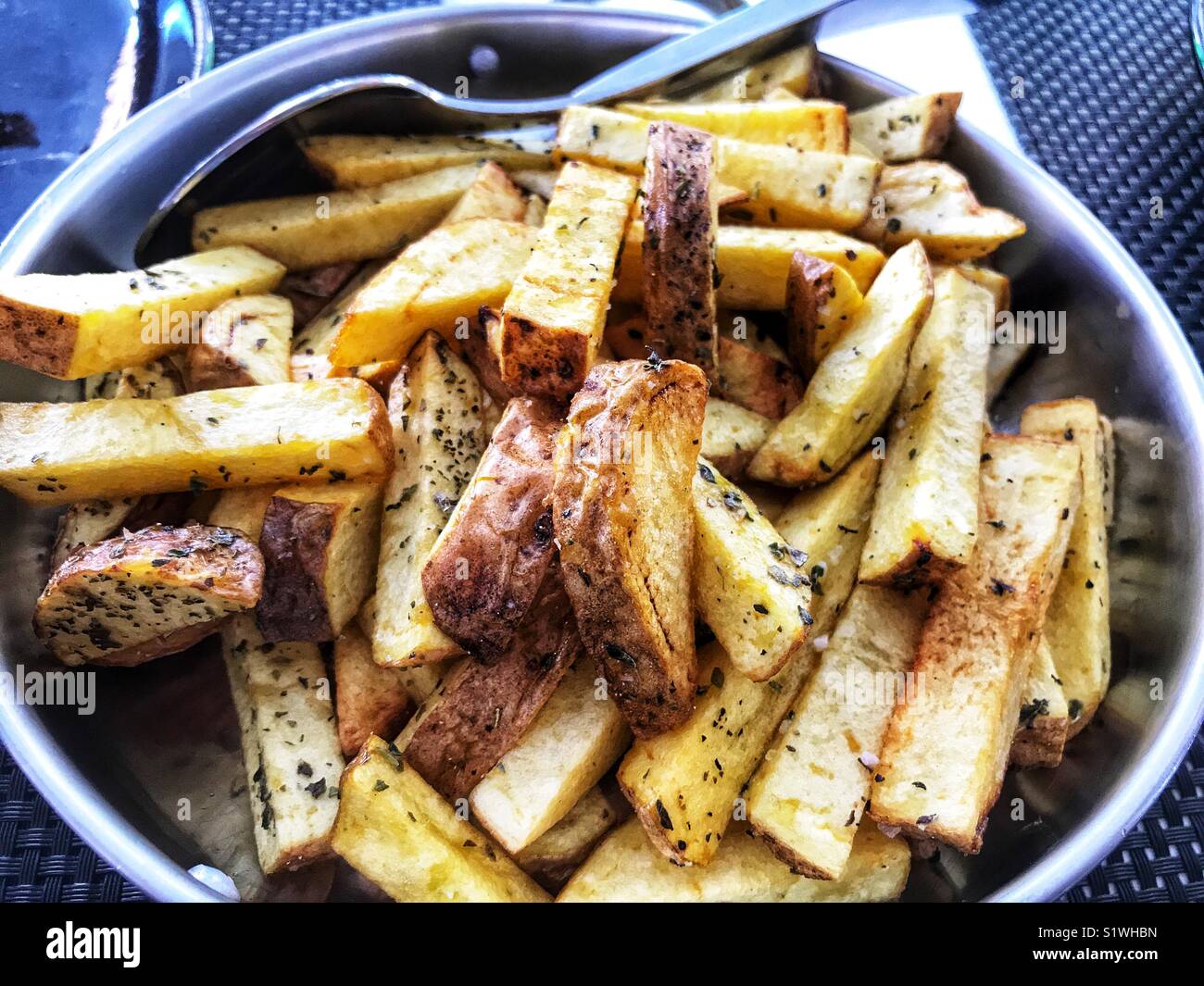 French fries in a serving dish Stock Photo - Alamy