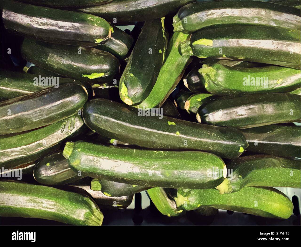 Basket of fresh courgettes and zucchini. Roadside stand Stock Photo - Alamy
