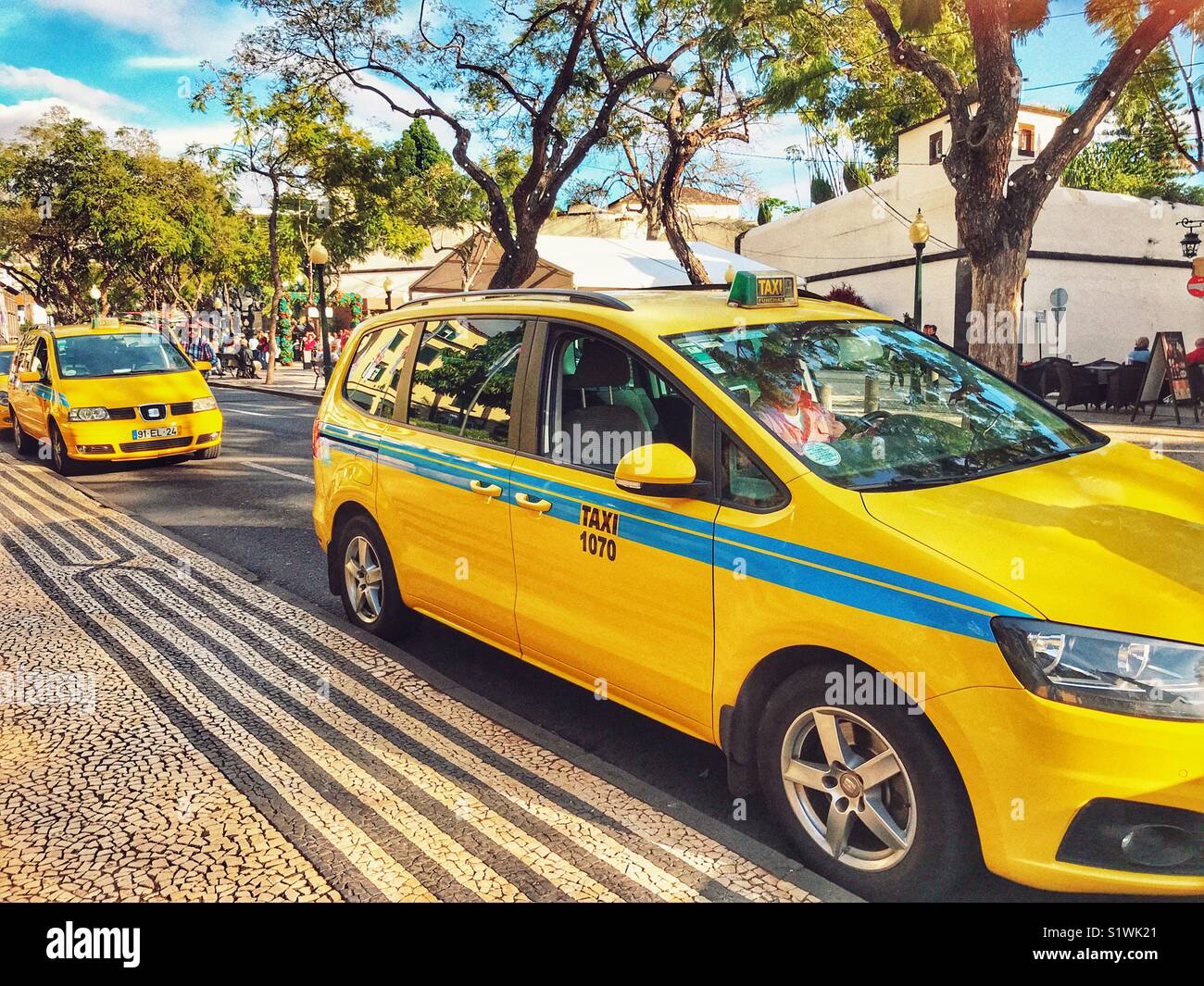 Taxis waiting for clients, queuing in Avenida Arriaga, Funchal, Madeira ...