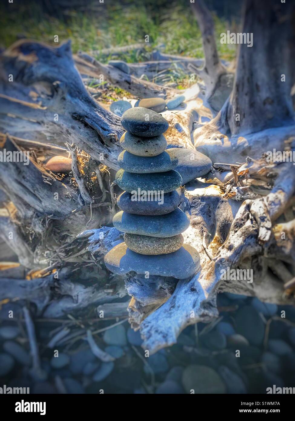 Stones stacked into a cairn Stock Photo - Alamy