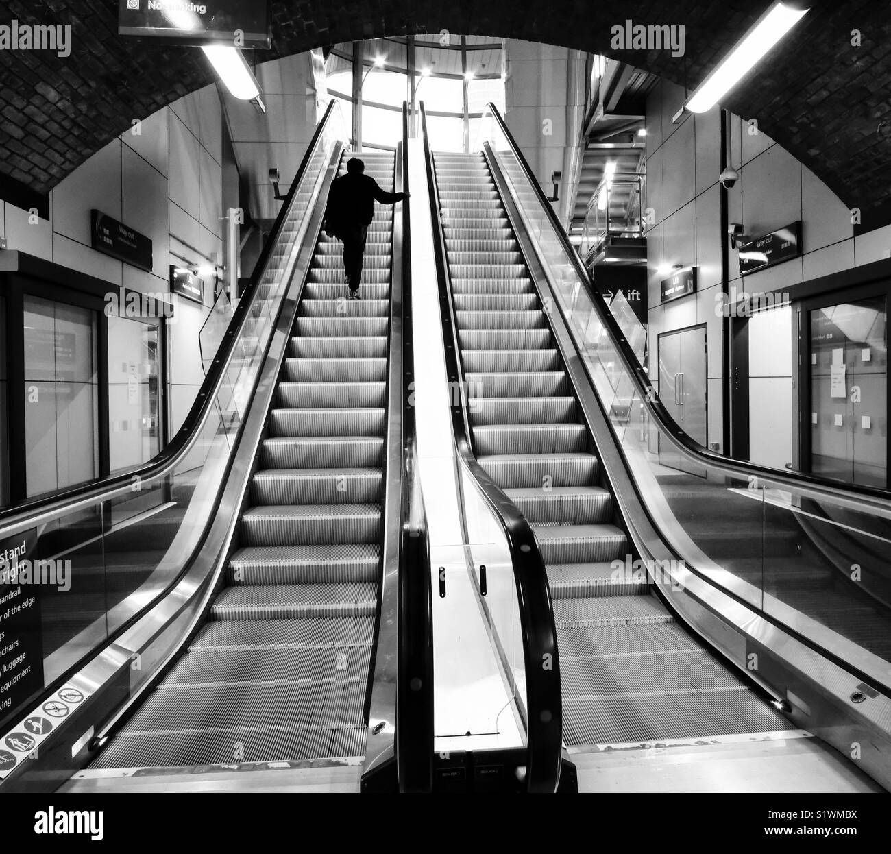 Escalator uk Black and White Stock Photos & Images - Alamy