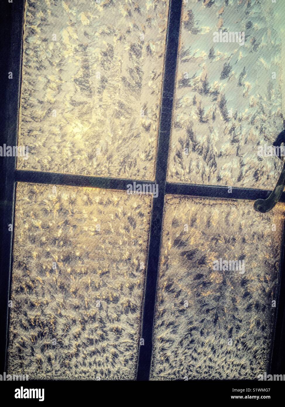 Ice encrusted casement window during winter storm in New York City ...