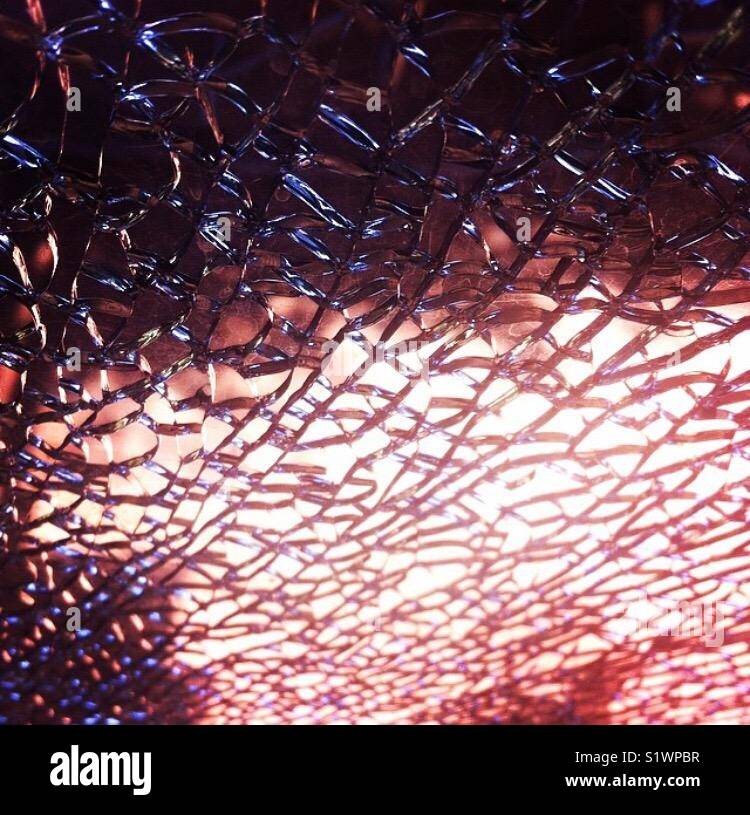 Shattered glass in window Stock Photo - Alamy