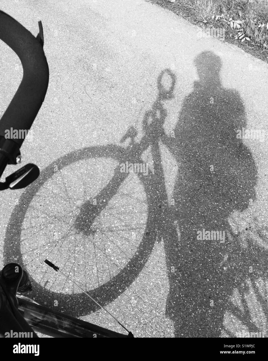 Bike with shadow hi-res stock photography and images - Alamy