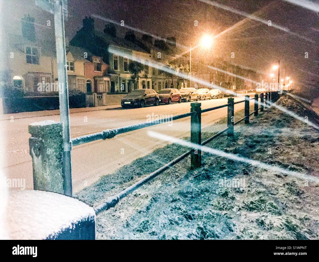 Snowy street late at night Stock Photo - Alamy