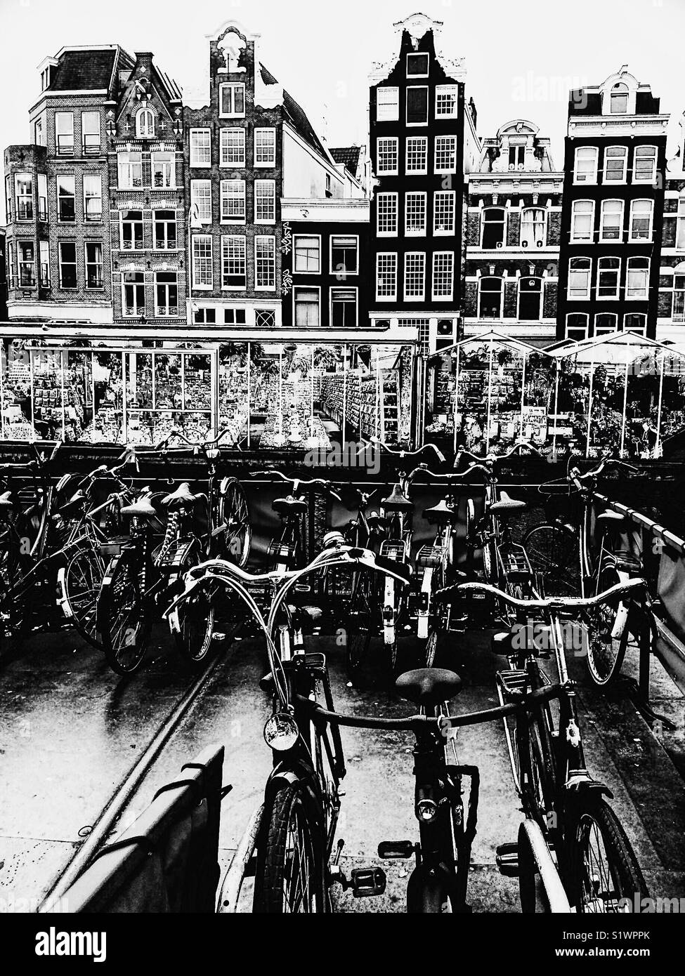 Floating flower market, traditional houses and bicycle parking, Singel ...
