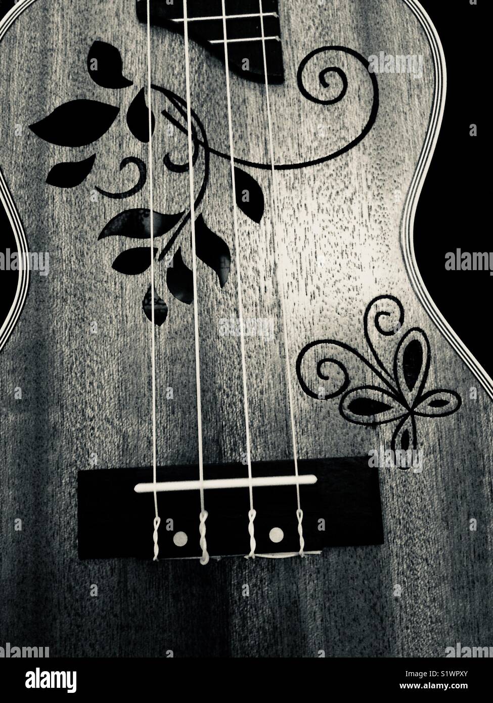 Wooden ukulele hi-res stock photography and images - Alamy