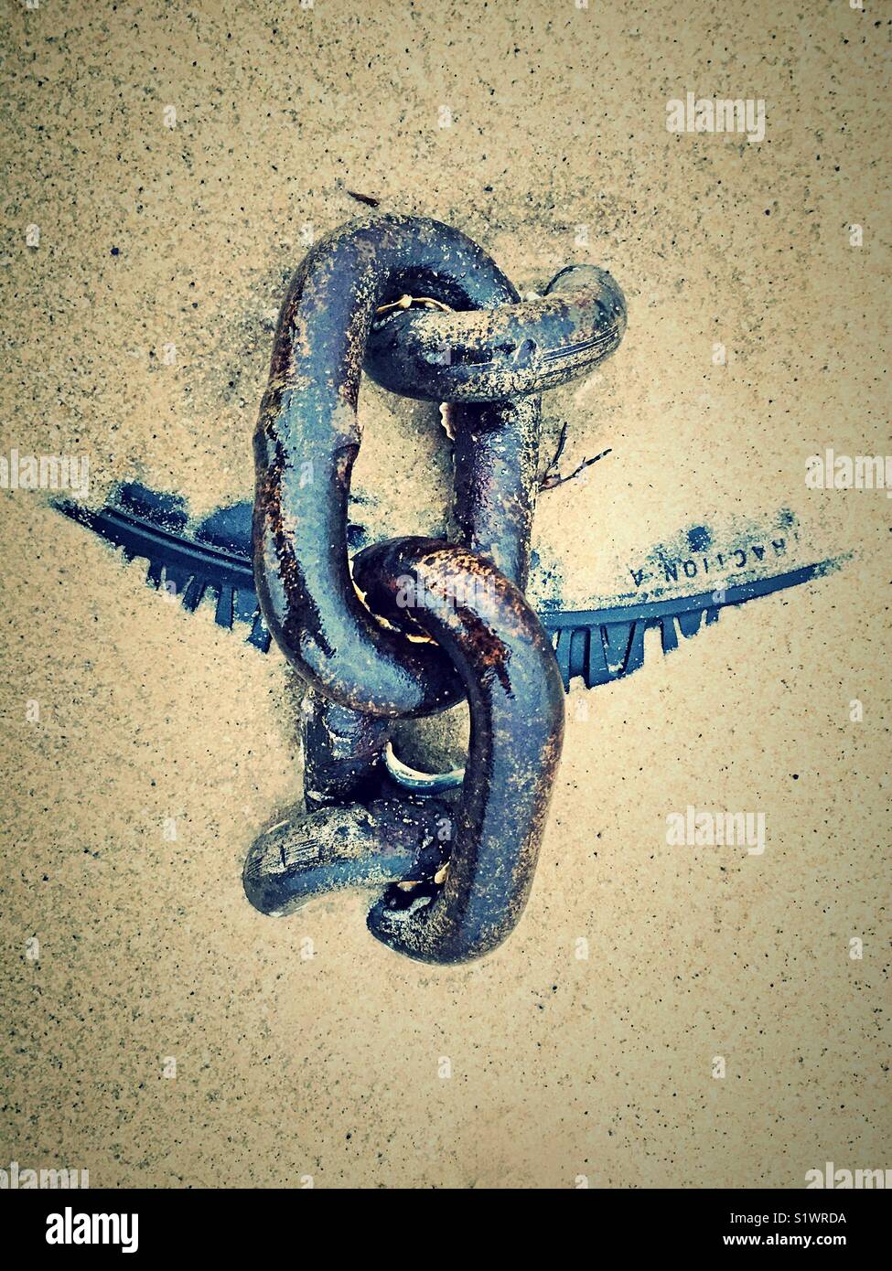 Chain Buried In Sand Stock Photo - Alamy