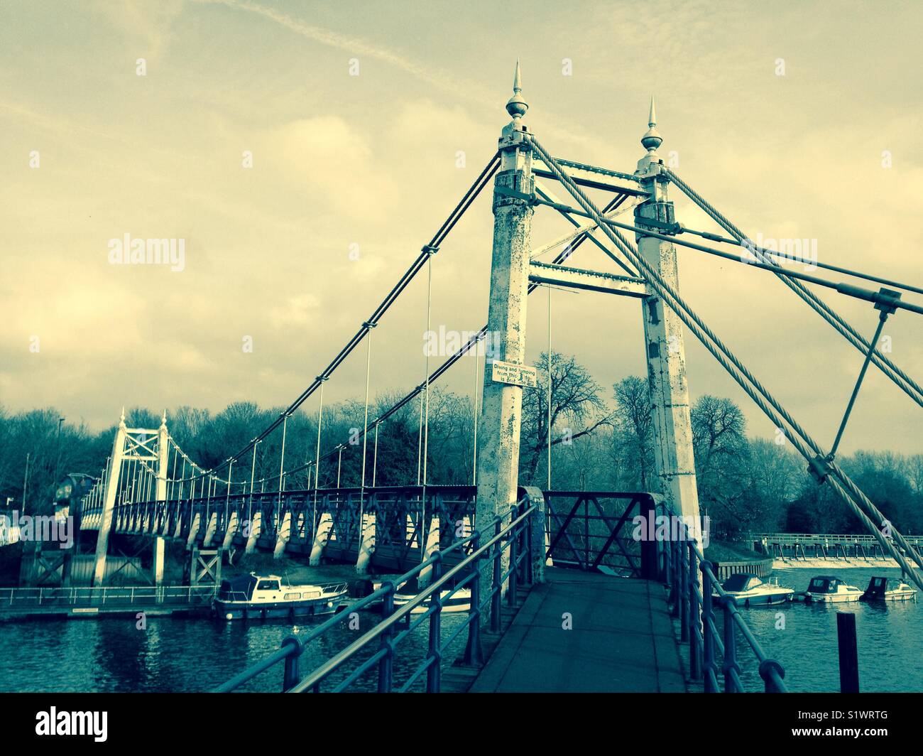 The footbridge over the river Thames at Teddington Lock. Teddington, UK ...