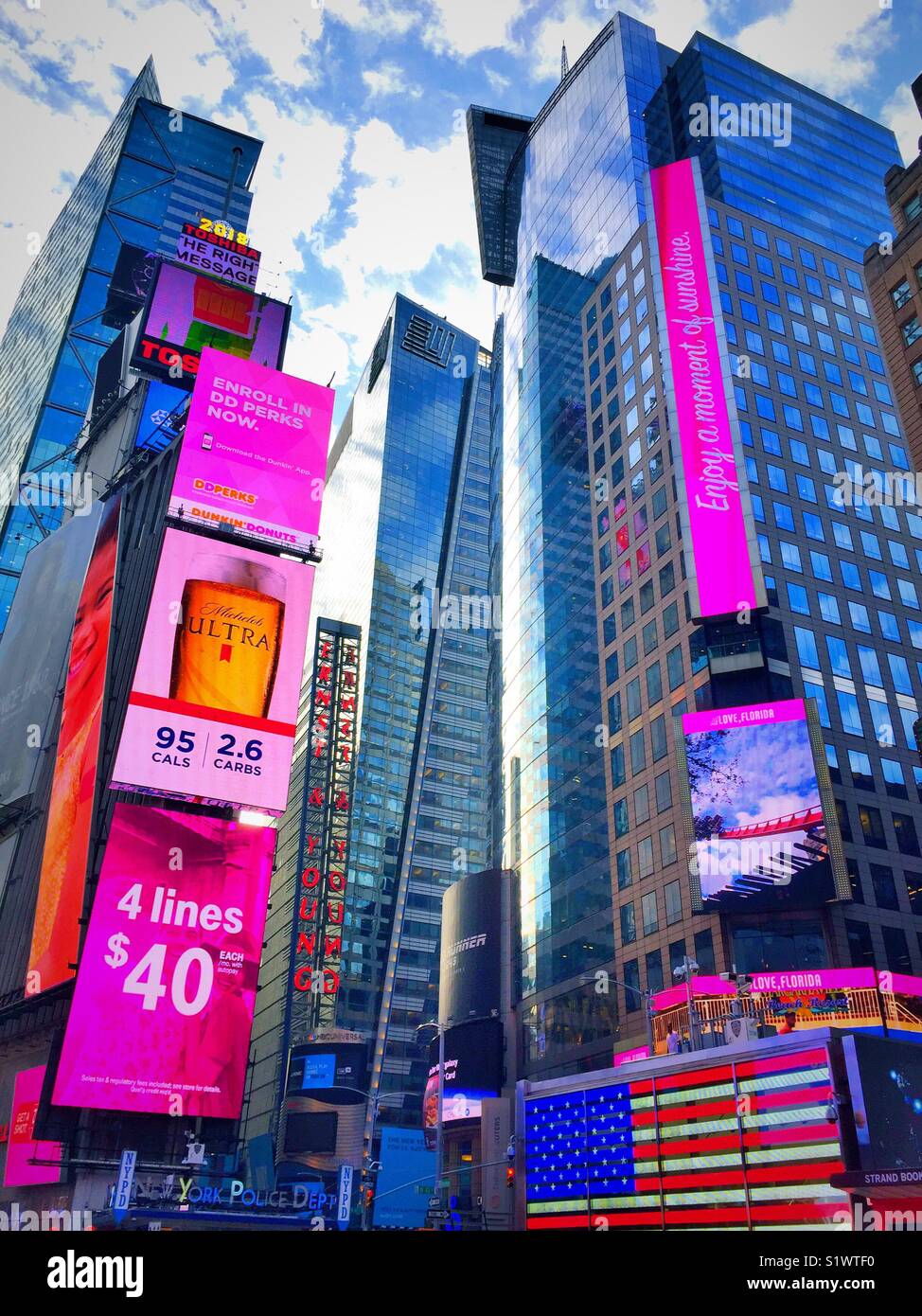 Brightly lit electronic billboards on buildings in Times Square, New ...