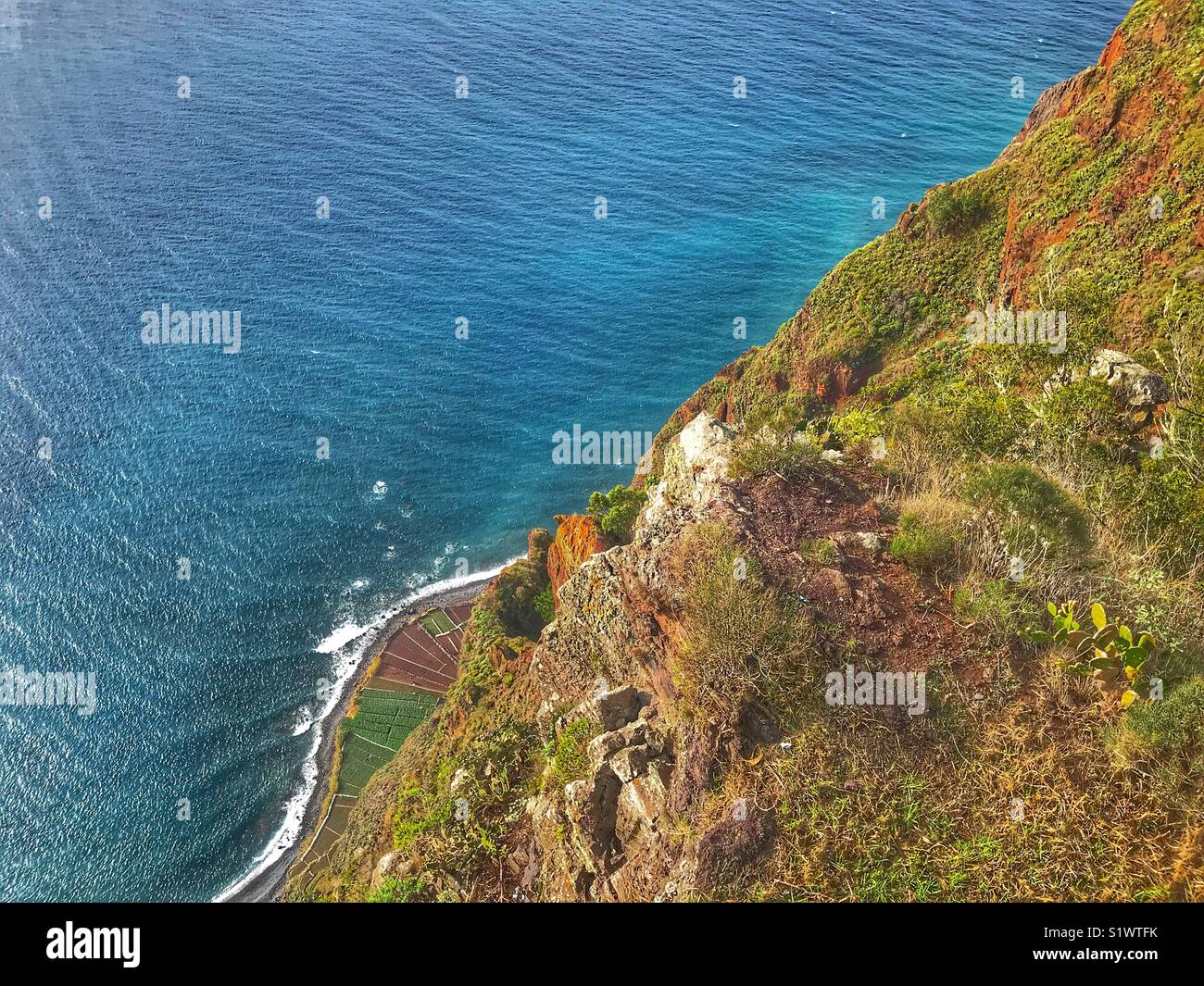 Looking down from the glass skywalk viewing platform 580m above the sea ...