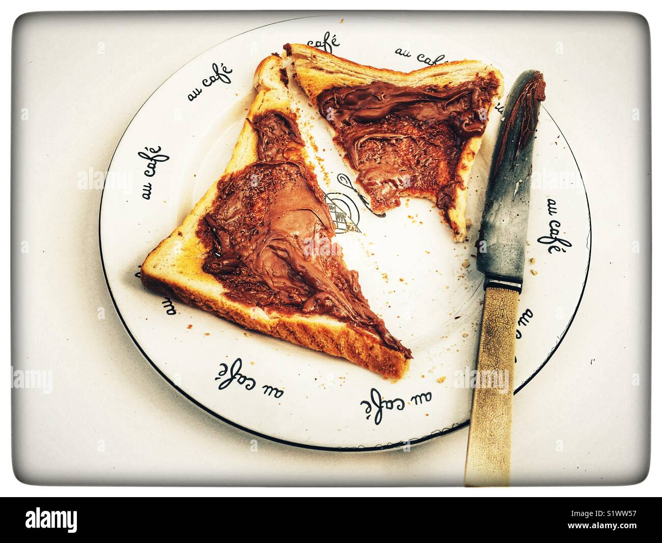 Nutella spread on toast Stock Photo - Alamy