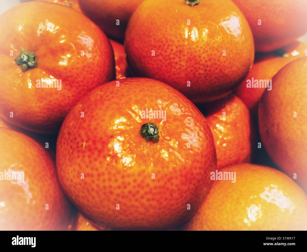Clementine oranges in a bowl, close up Stock Photo - Alamy