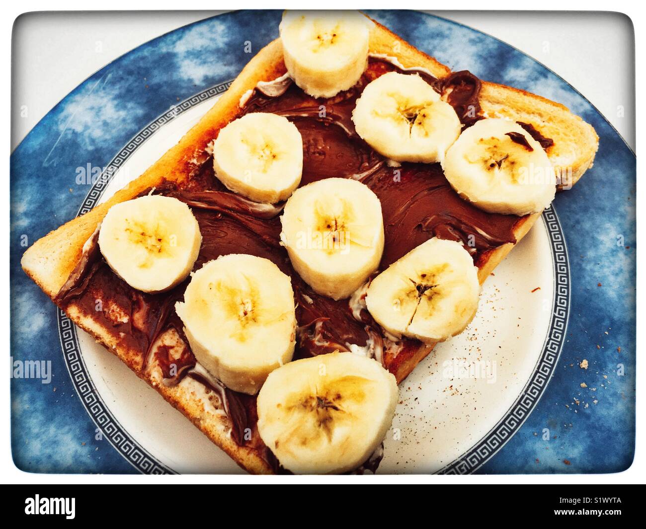 Nutella with sliced banana on toast hi-res stock photography and images ...