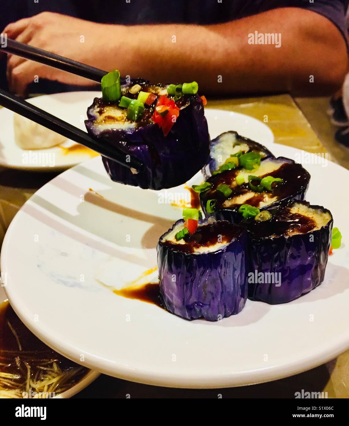 Shanghainese style of braised aubergine Stock Photo - Alamy