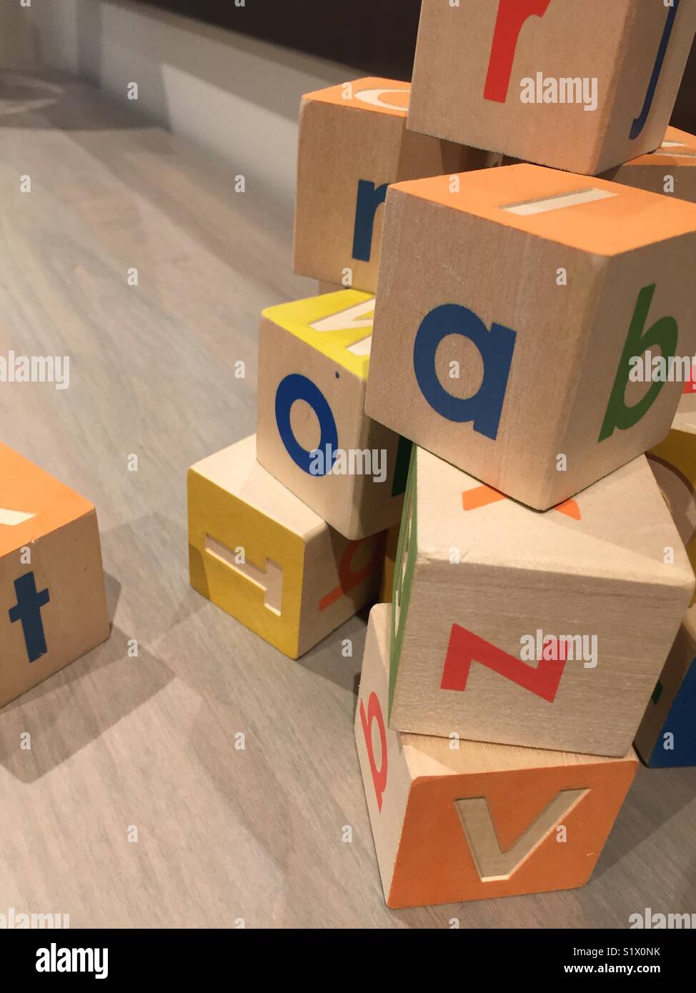 Stack of children’s letter blocks, United States Stock Photo - Alamy