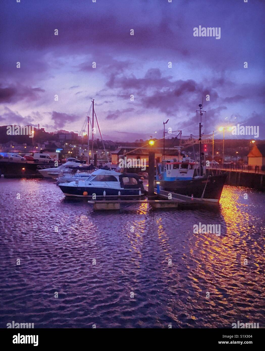 Sheltered harbour before the storm Stock Photo - Alamy