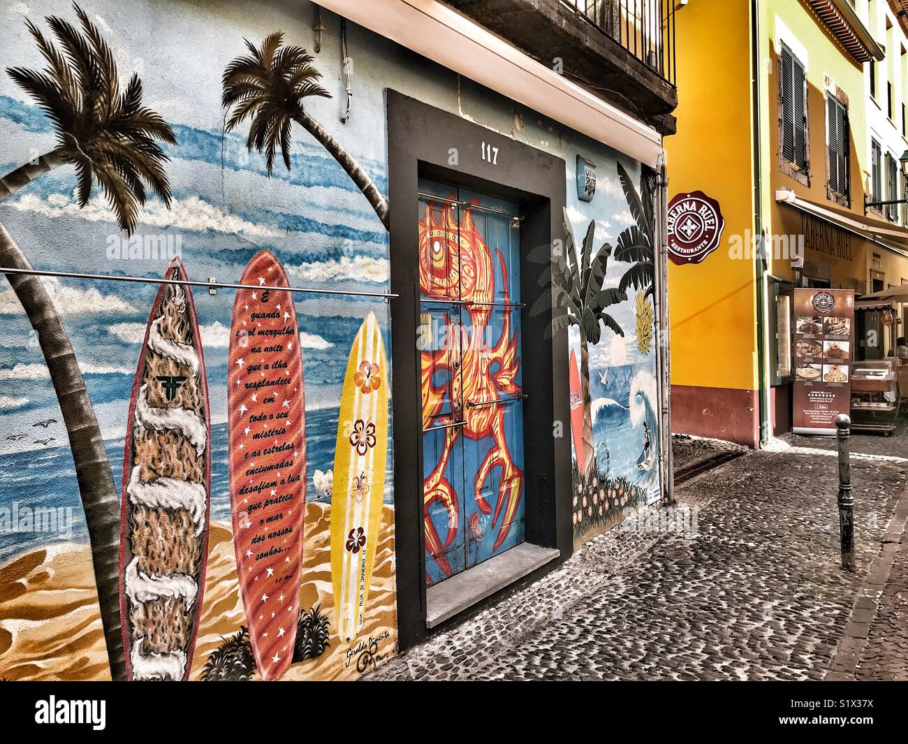 Street scene showing the painted doors art project in the rejuvenated ...