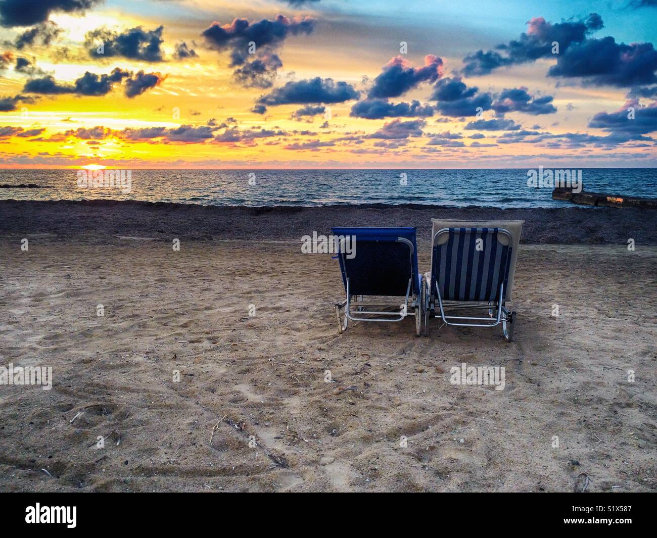 Yellow sun beds hi-res stock photography and images - Alamy