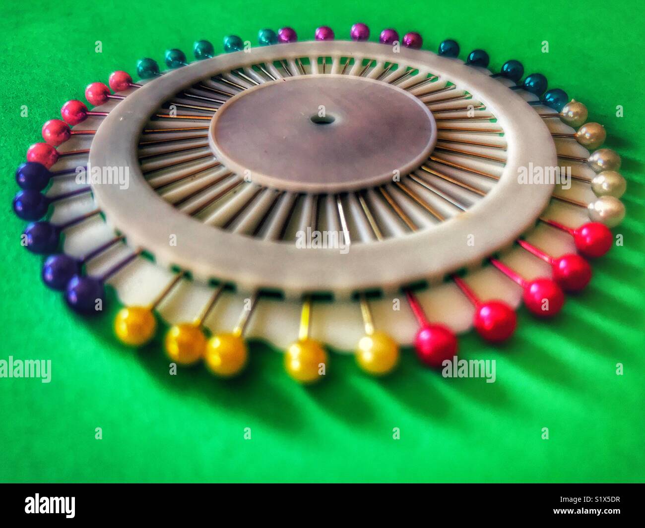Pins in a pin wheel Stock Photo - Alamy