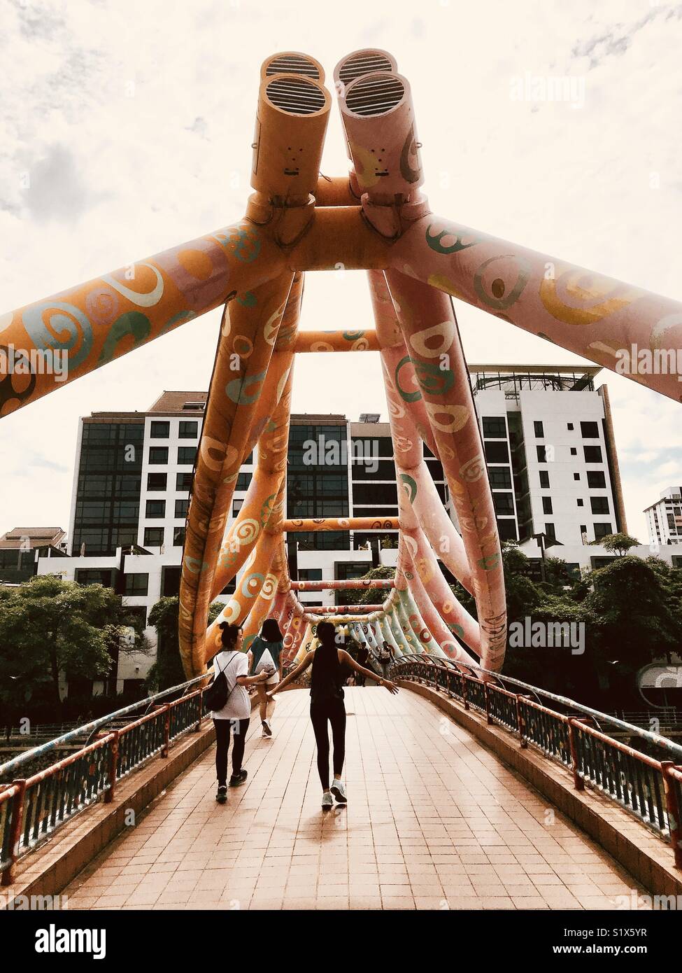 Kids crossing Alkaff Bridge, Singapore Stock Photo - Alamy