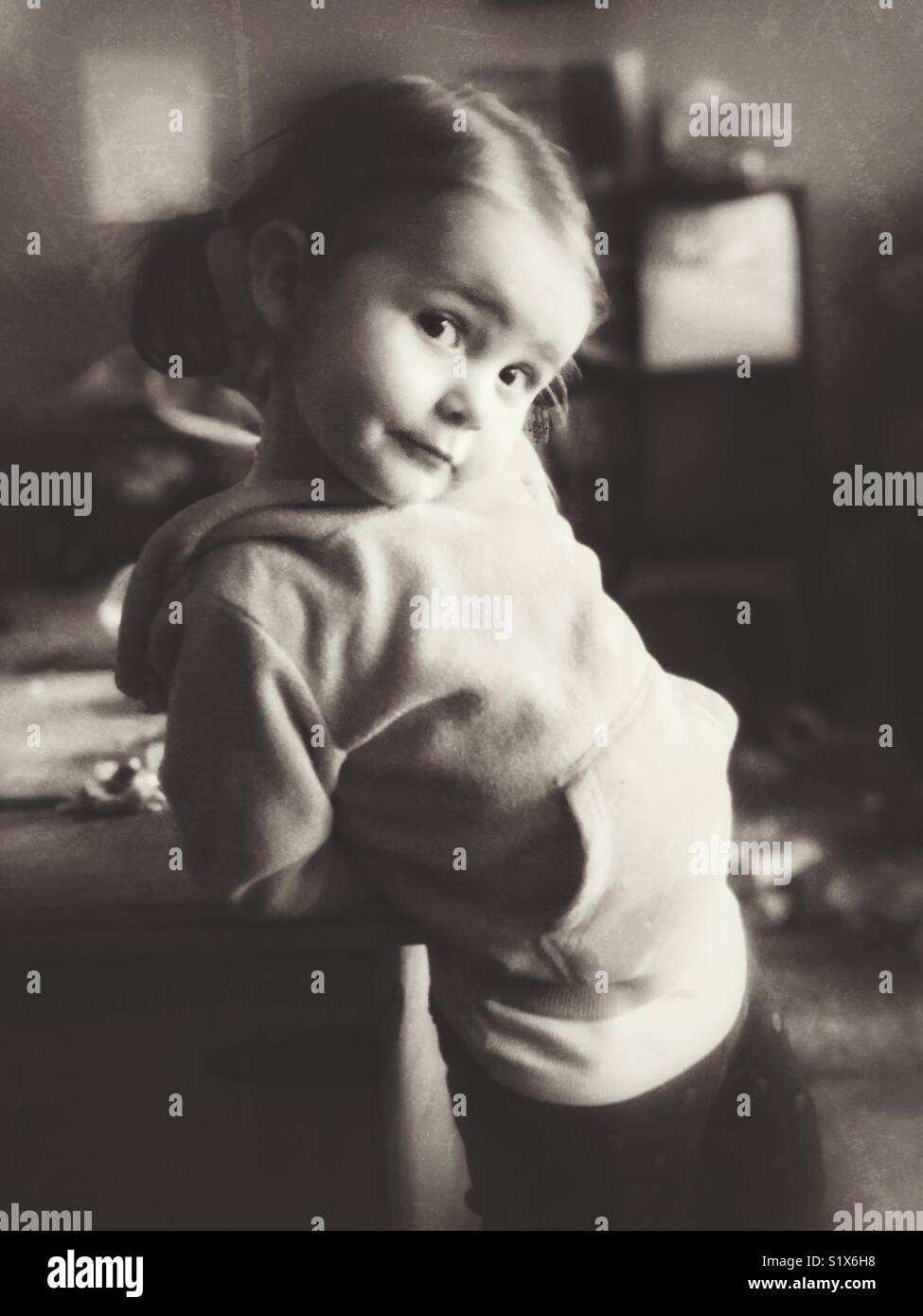 Coy expression hi-res stock photography and images - Alamy