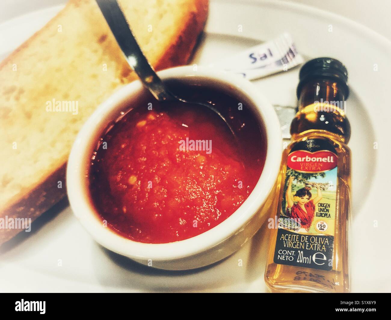 Typical Spanish tapas, tostada con tomato, toasted bread with crushed ...