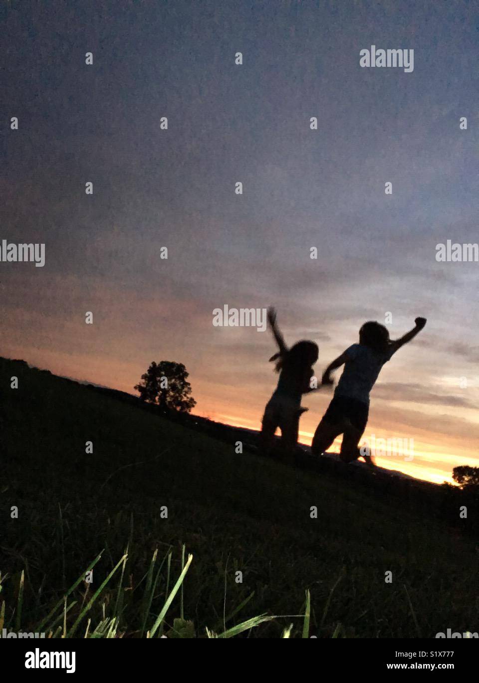 Sunsets and silhouettes hi-res stock photography and images - Alamy