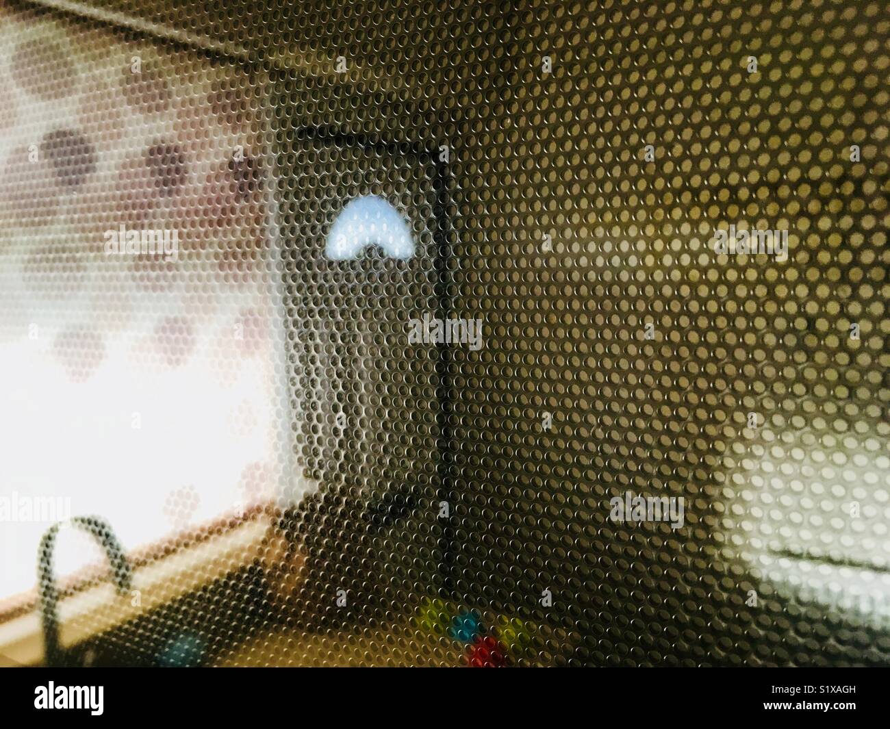 Reflection in microwave glass Stock Photo - Alamy