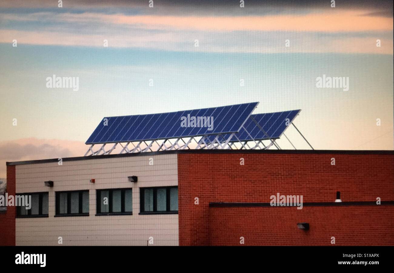 Solar panels on a school building Stock Photo - Alamy