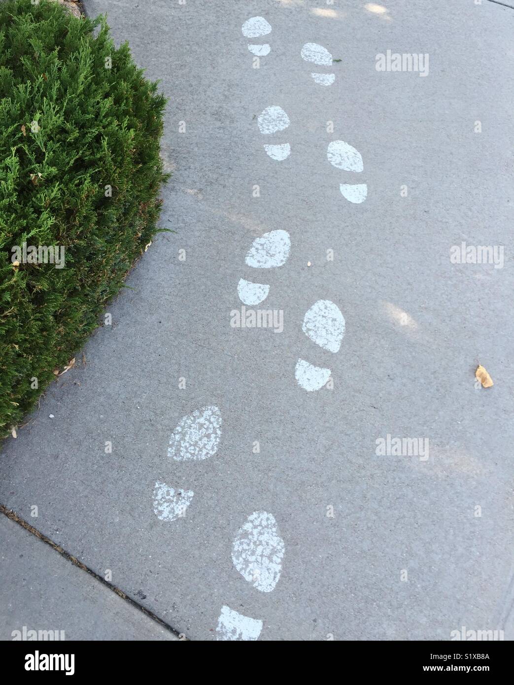 Footprints on pavement hi-res stock photography and images - Alamy