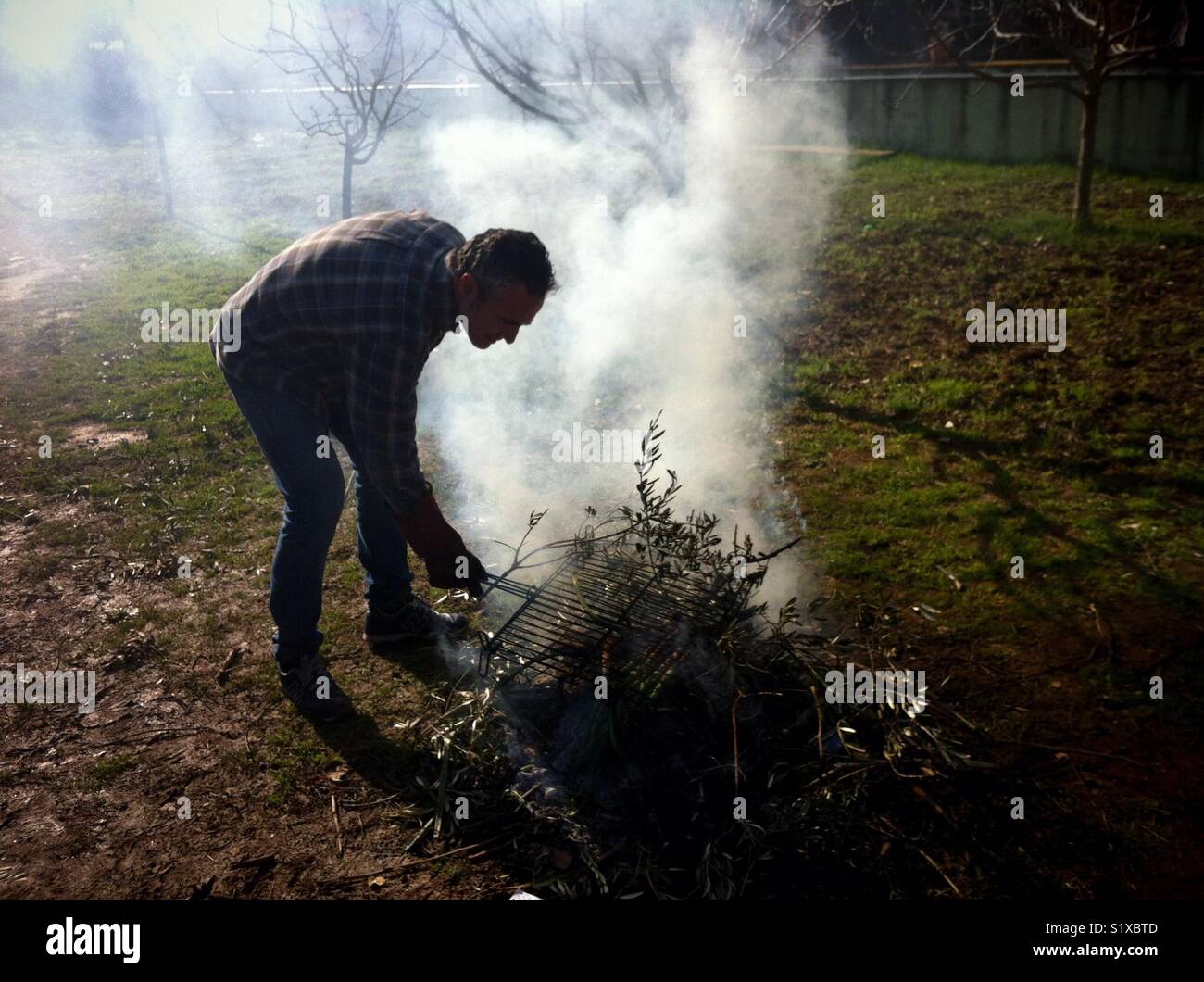 Cooking on the fire hi-res stock photography and images - Alamy