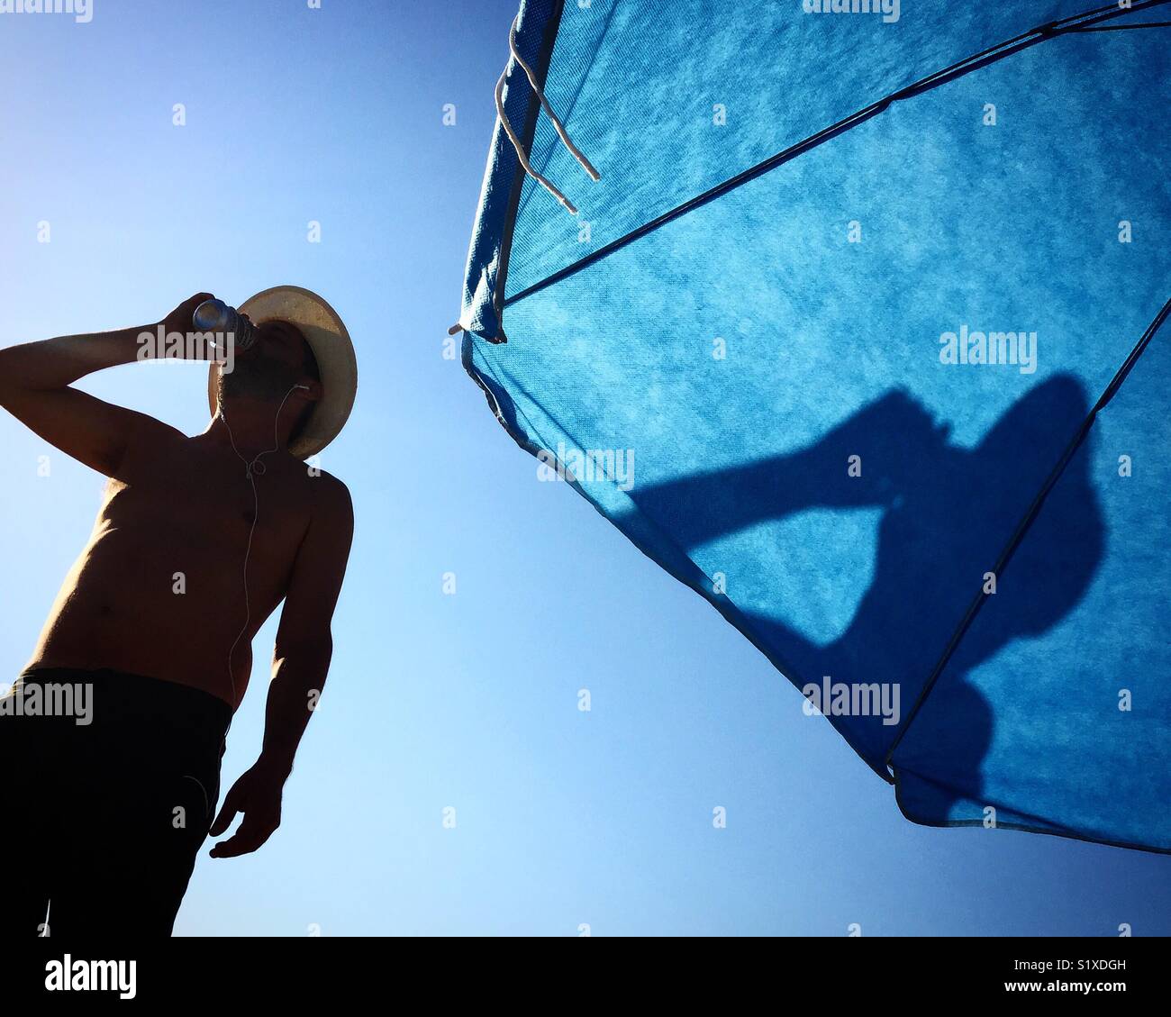Silhouette man drinking beer hi-res stock photography and images - Alamy