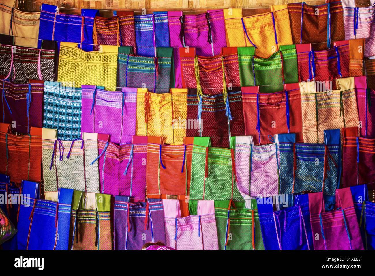 Colorful scarves made by Padaung women, Inle Lake, Myanmar Stock Photo ...