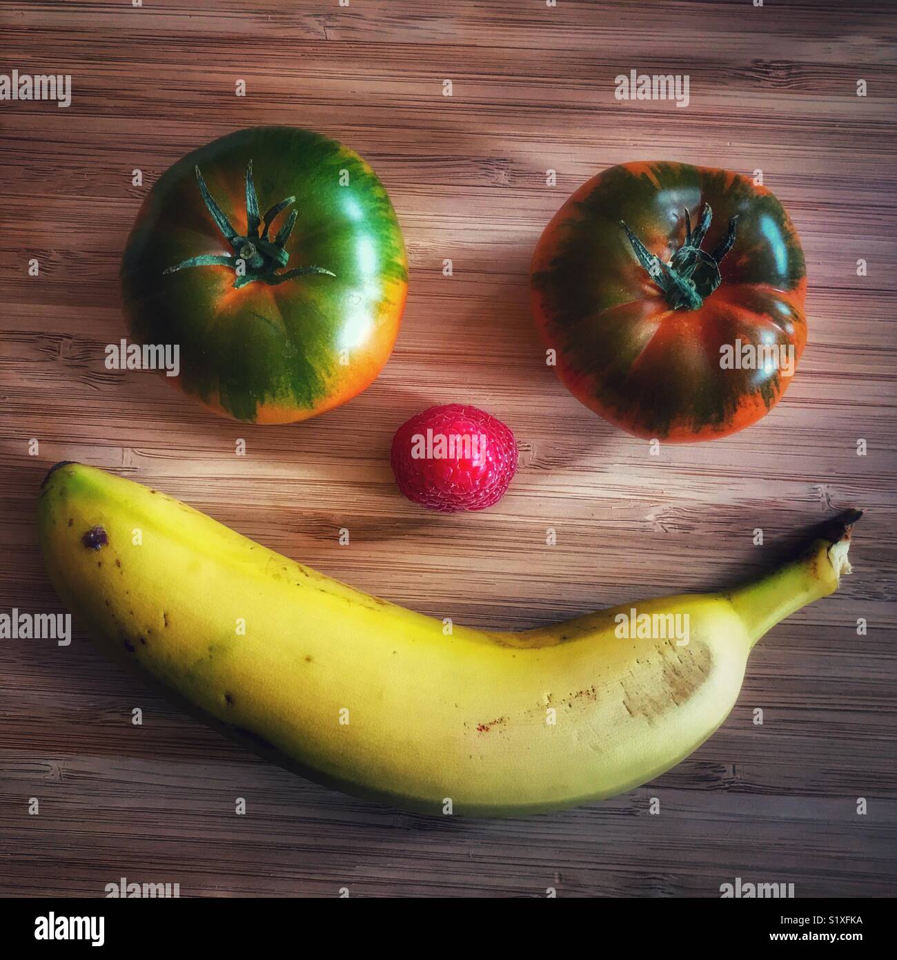 Fruit face, smiling, concept of healthy eating Stock Photo - Alamy