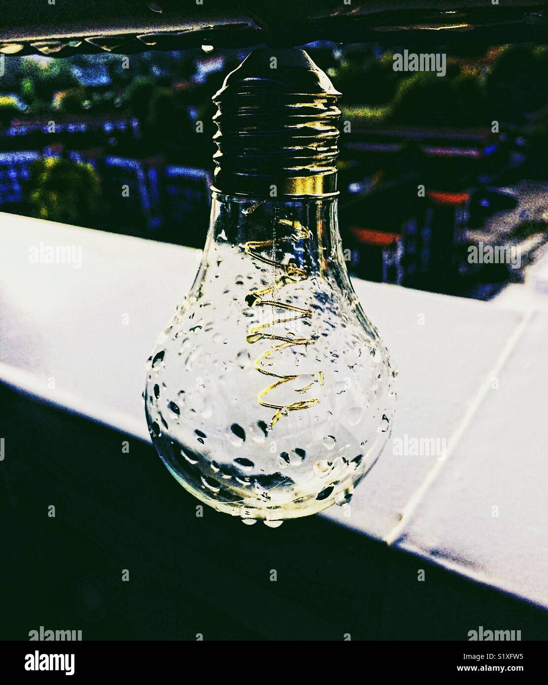 Wet lightbulb on terrace Stock Photo - Alamy