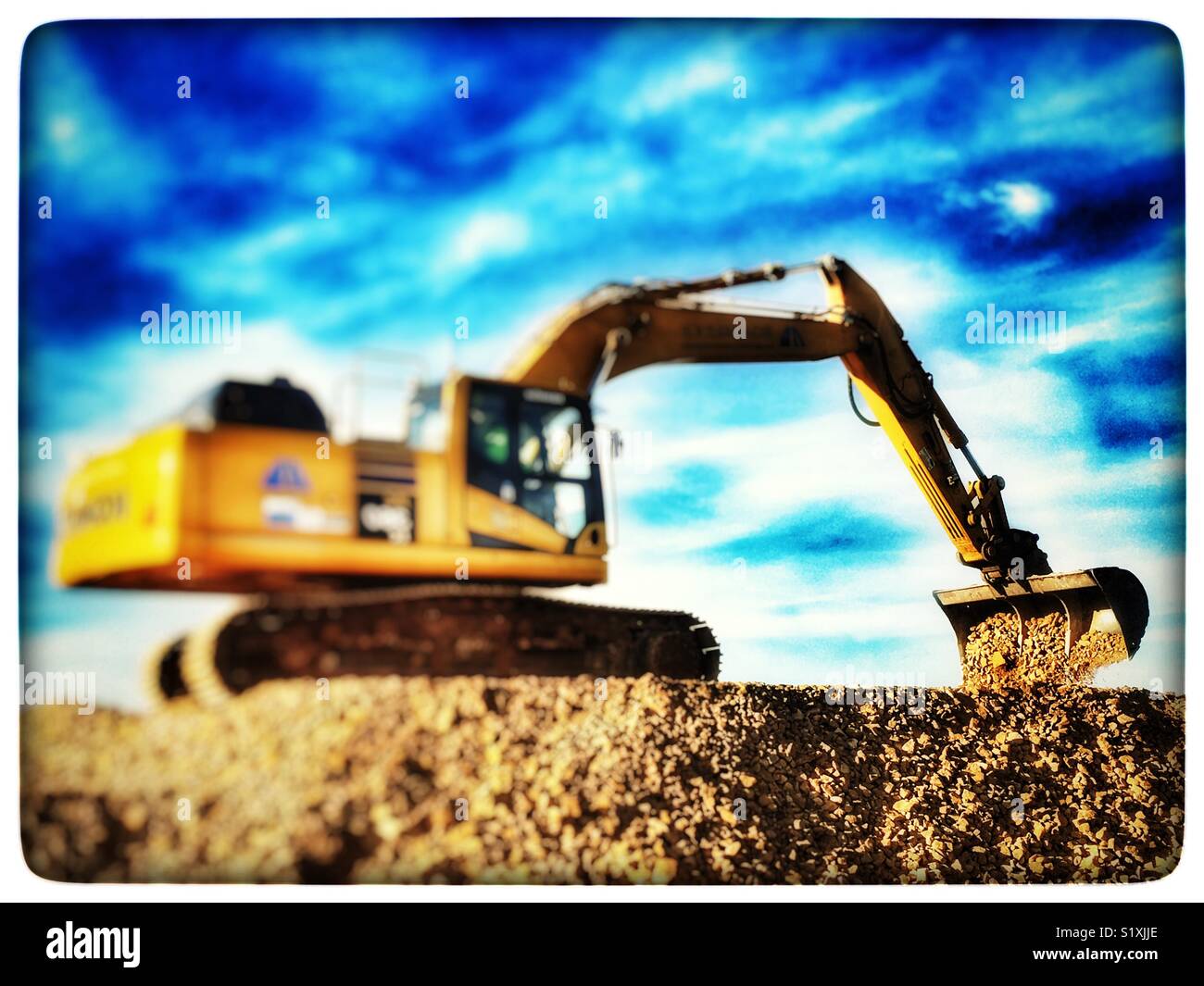 Komatsu mechanical digger Stock Photo - Alamy