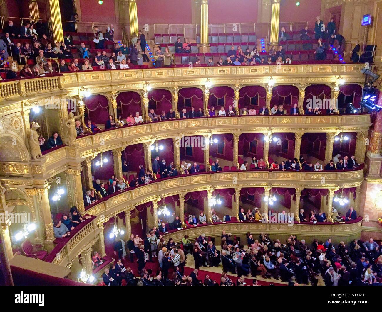 Attending a show at the Budapest Opera House Stock Photo - Alamy